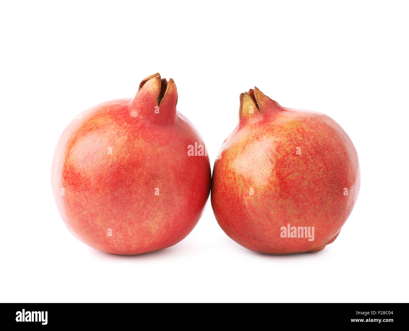 Two pomegranate composition isolated Stock Photo - Alamy