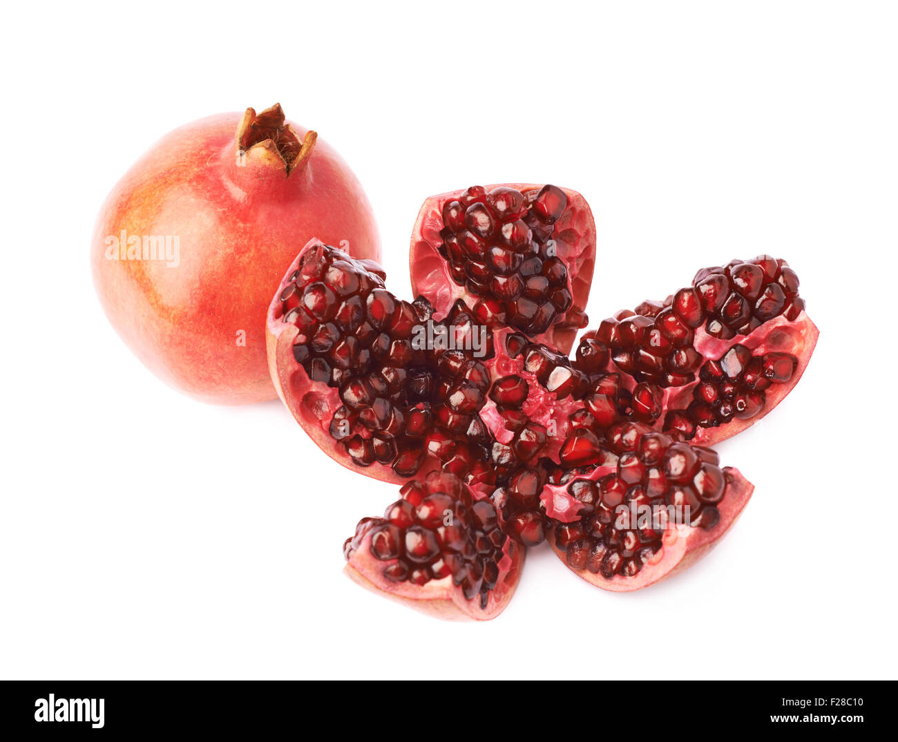 Split open pomegranate fruit Stock Photo - Alamy