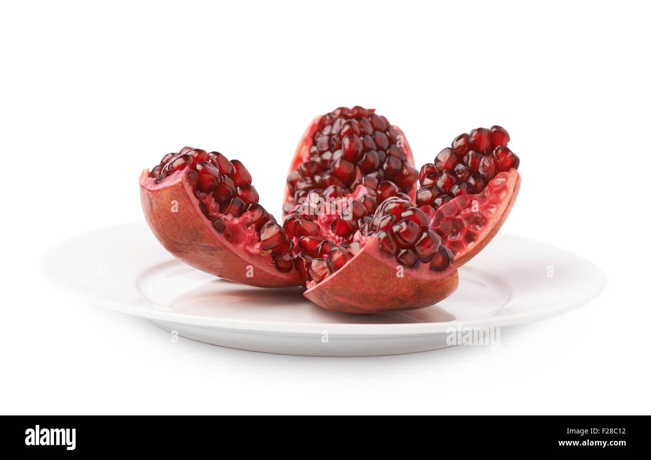 Split open pomegranate fruit Stock Photo - Alamy