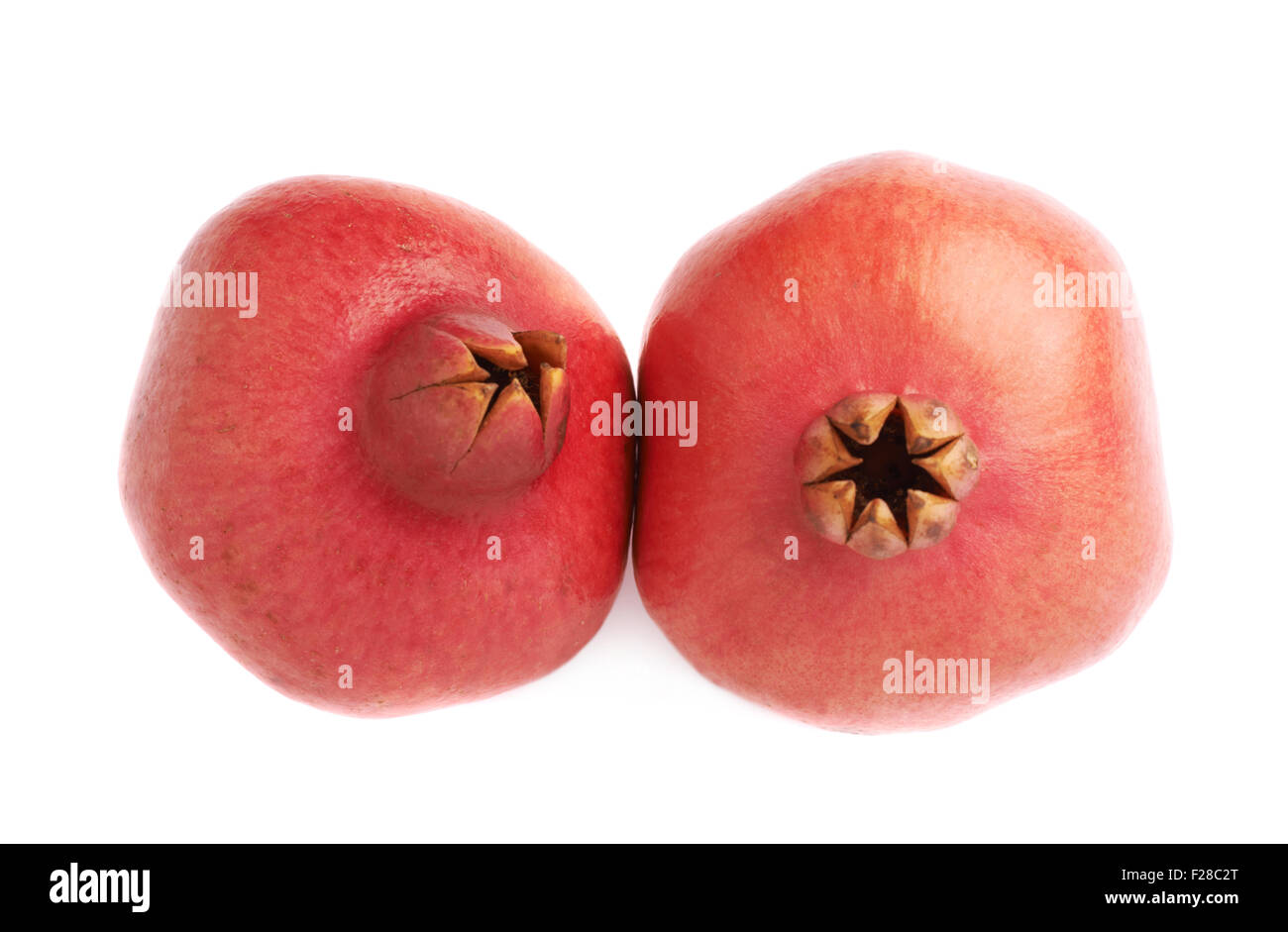 Two pomegranate composition isolated Stock Photo - Alamy