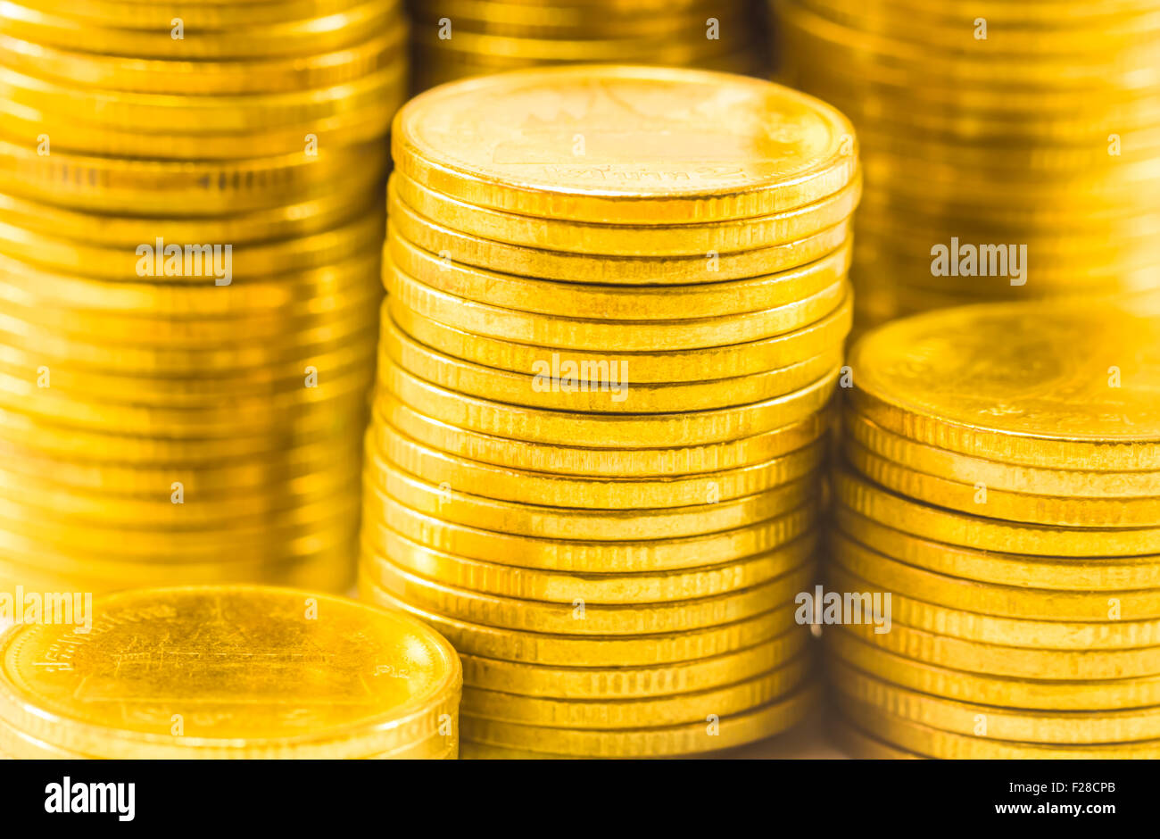 golden coins close up background Stock Photo - Alamy