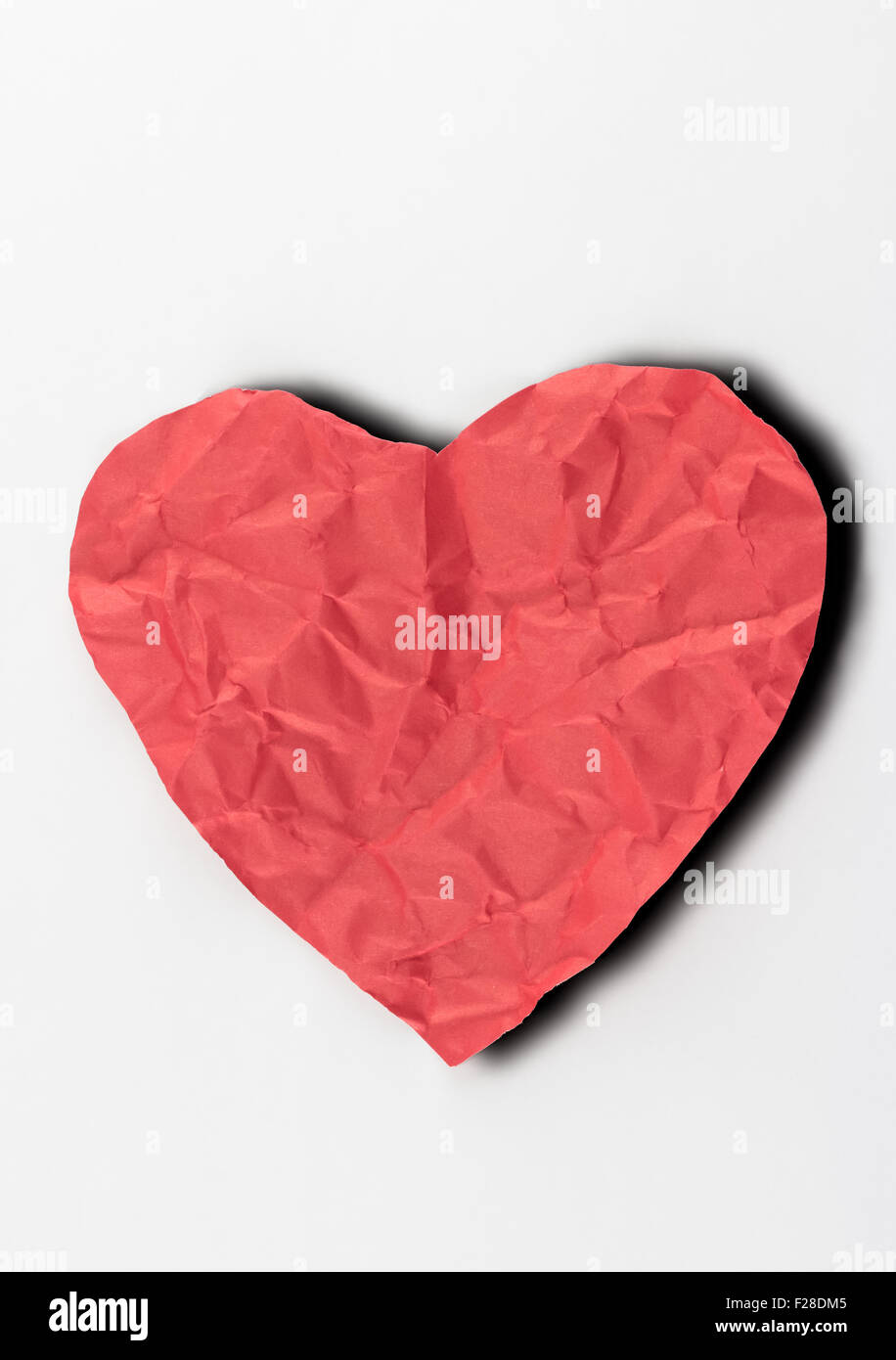 crumpled paper heart on white background Stock Photo - Alamy