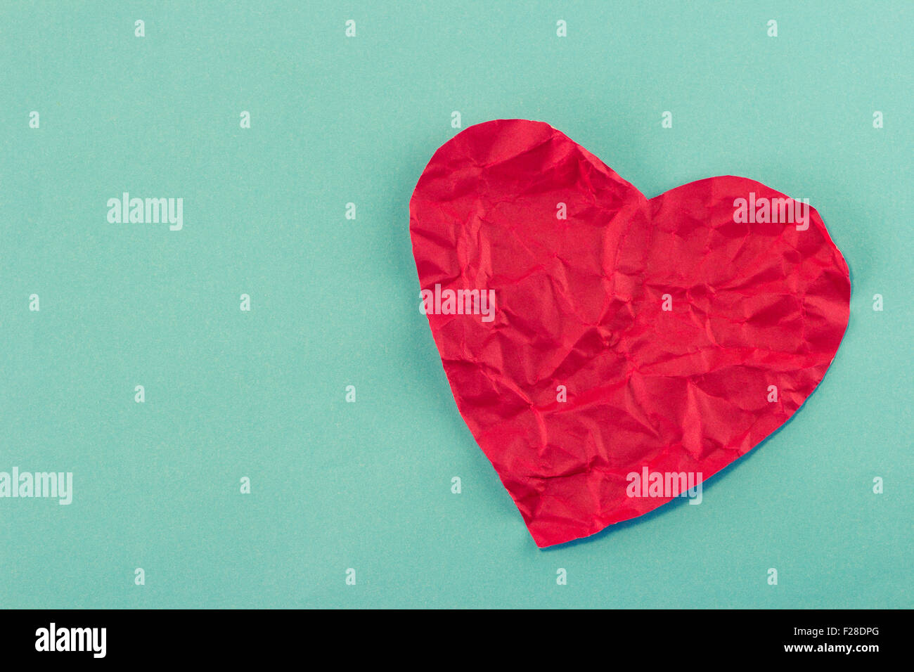 Woman cut heart shape paper hi-res stock photography and images - Alamy