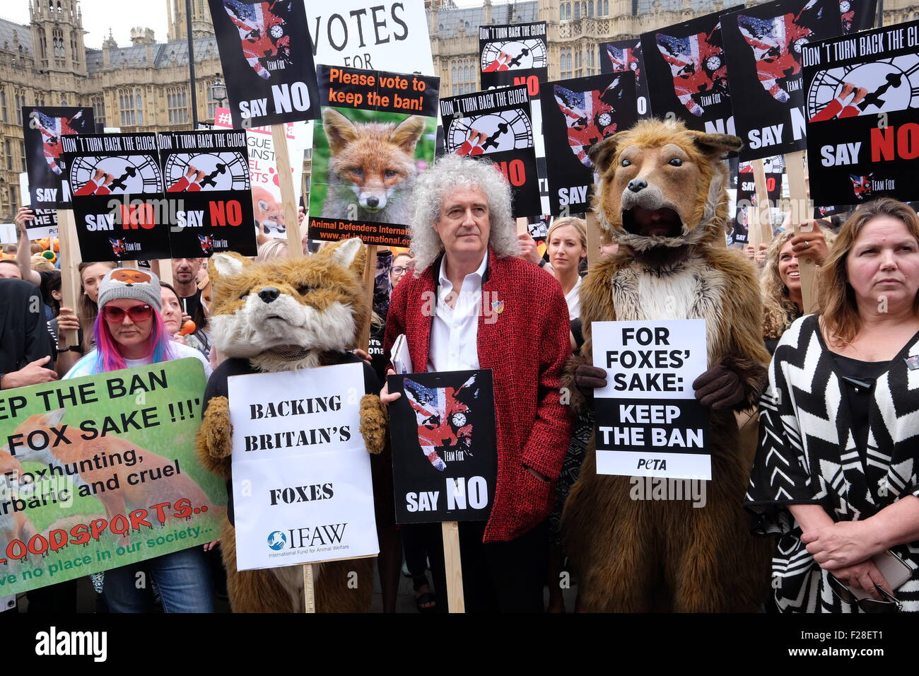 Brian May joins anti Hunt protesters outside parliament Featuring ...