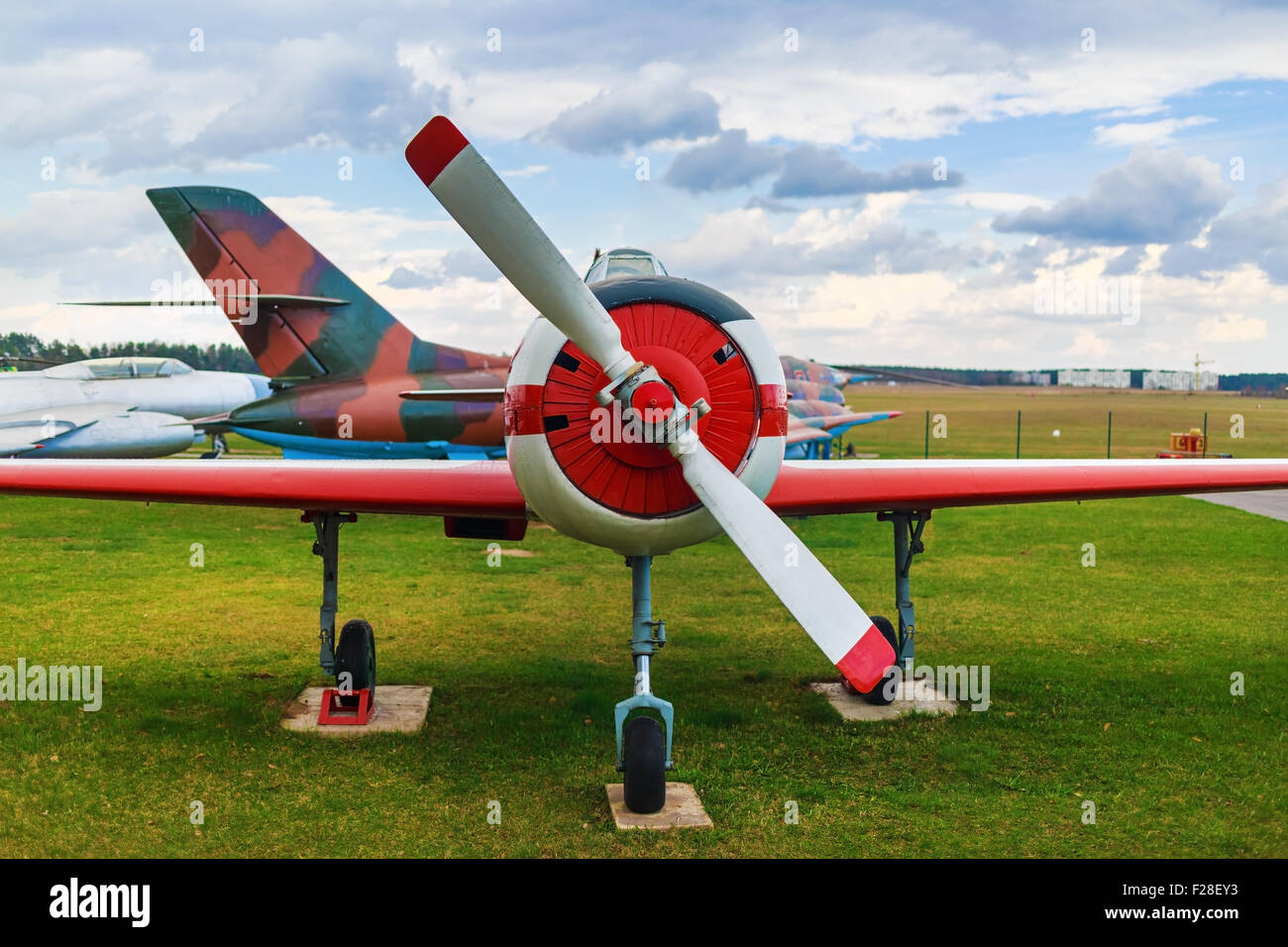 Old retro plane close-up. Front view, with the side of the fuselage and ...