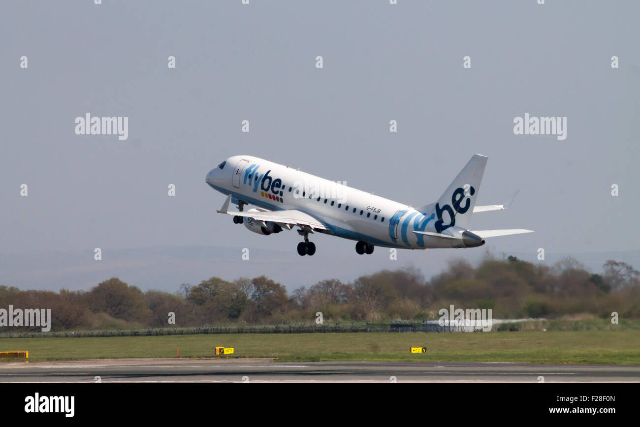 Flybe Embraer 175 passenger plane taking off from Manchester Airport ...