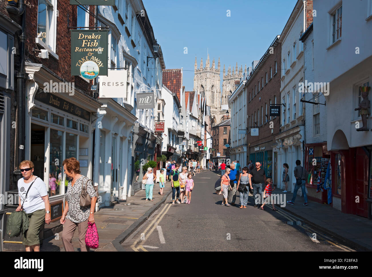 York city town centre people tourists visitors walking along Low ...
