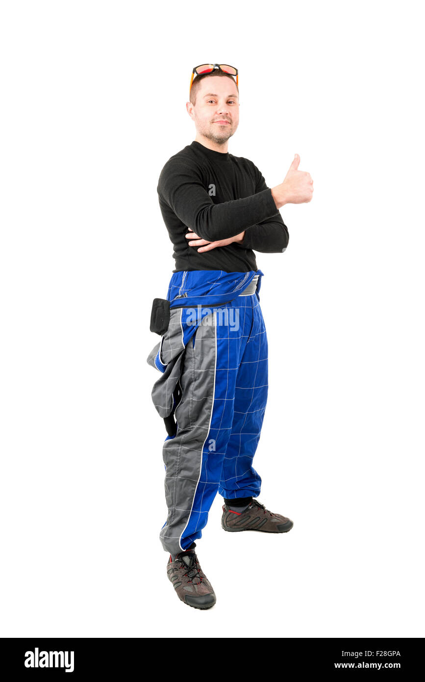 Racing driver posing in full gear isolated in white Stock Photo - Alamy