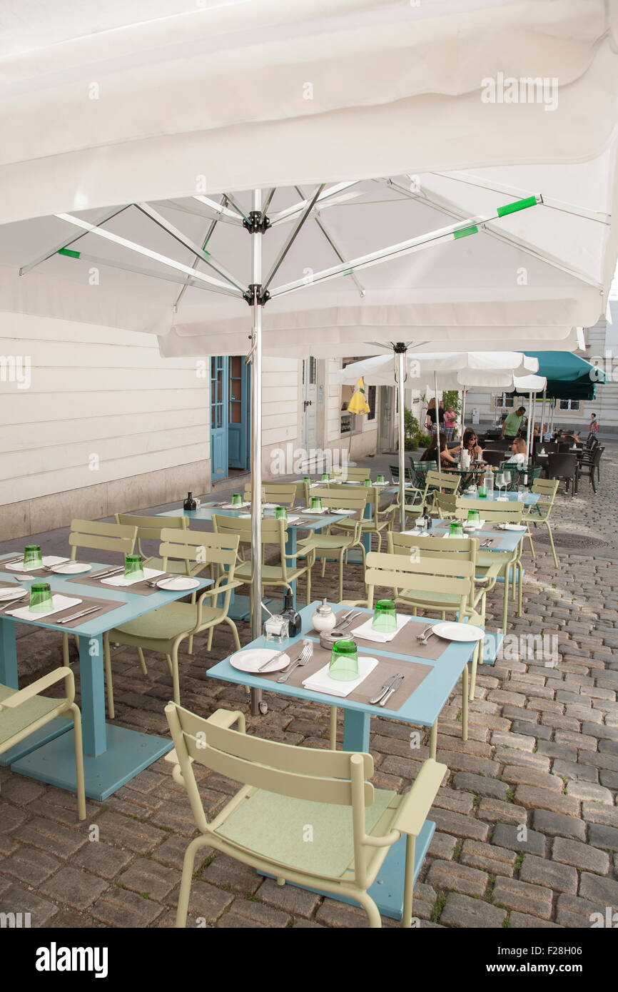 Cafe Tables and Chairs in Franziskanerplatz Street, Vienna, Austria ...