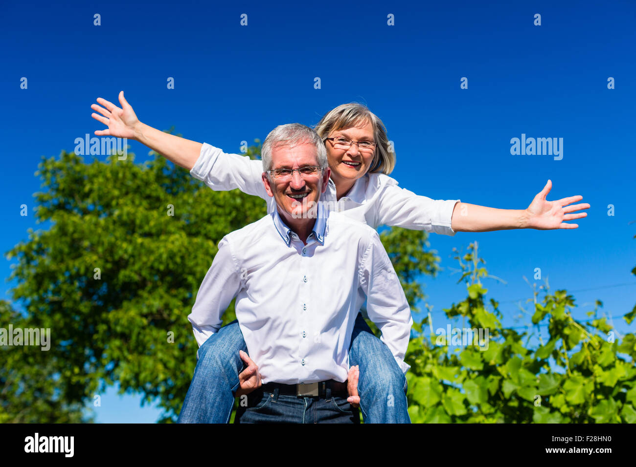 Man carrying woman hi-res stock photography and images - Alamy