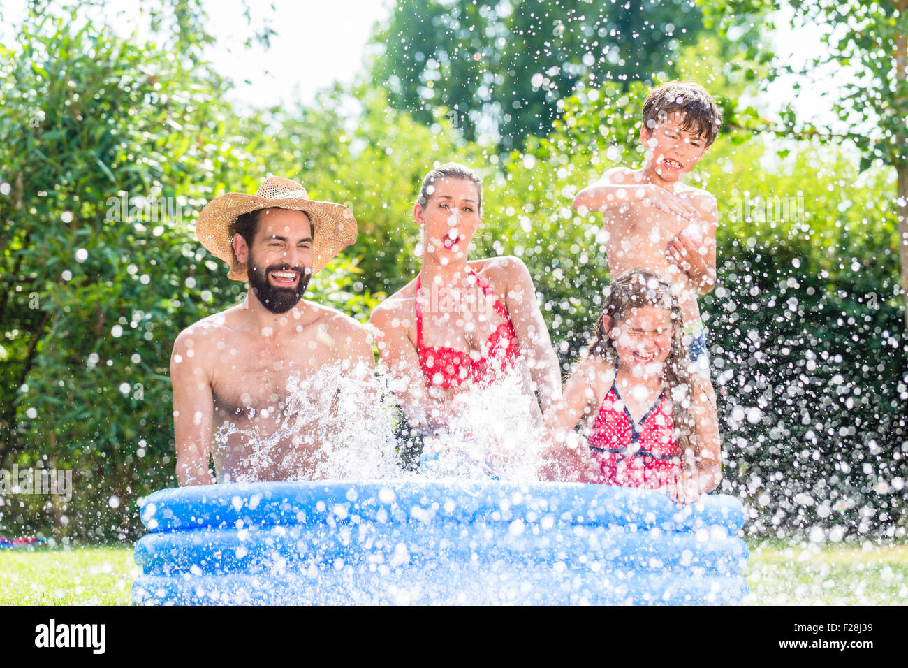 Summer garden pool family hi-res stock photography and images - Alamy