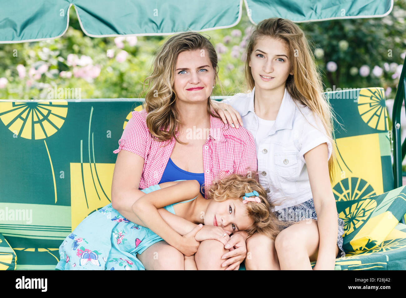 Mother and two daughters Stock Photo - Alamy