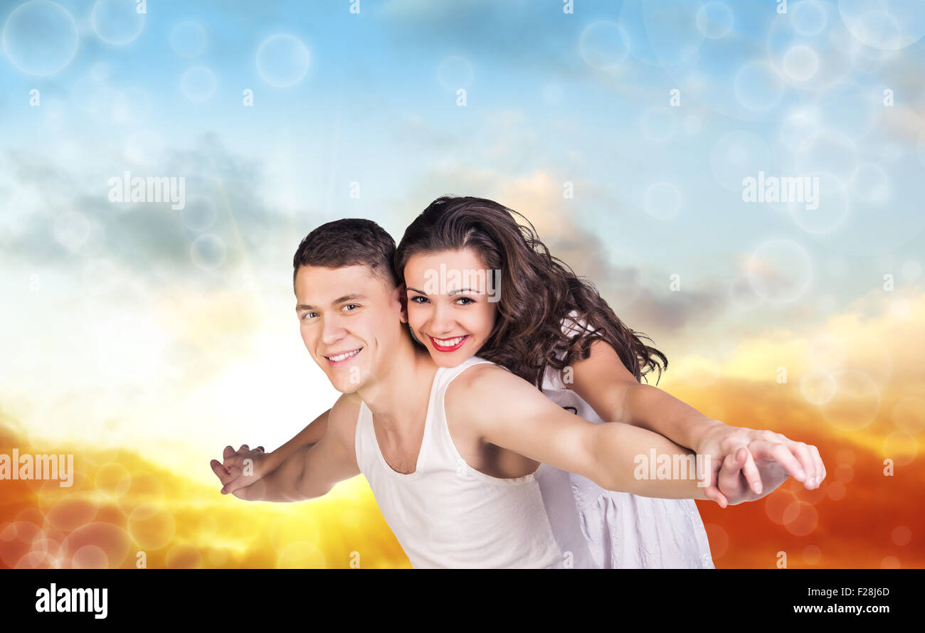 Young beautiful couple hugging Stock Photo - Alamy
