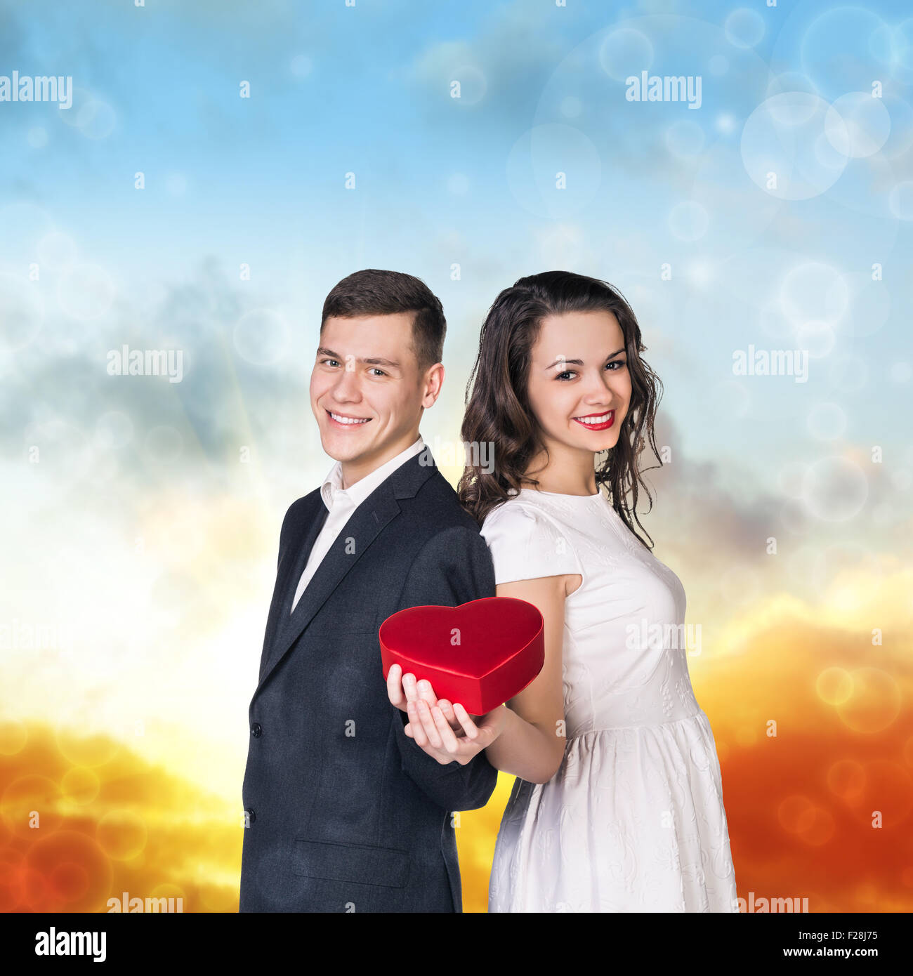 Young beautiful couple hugging Stock Photo - Alamy