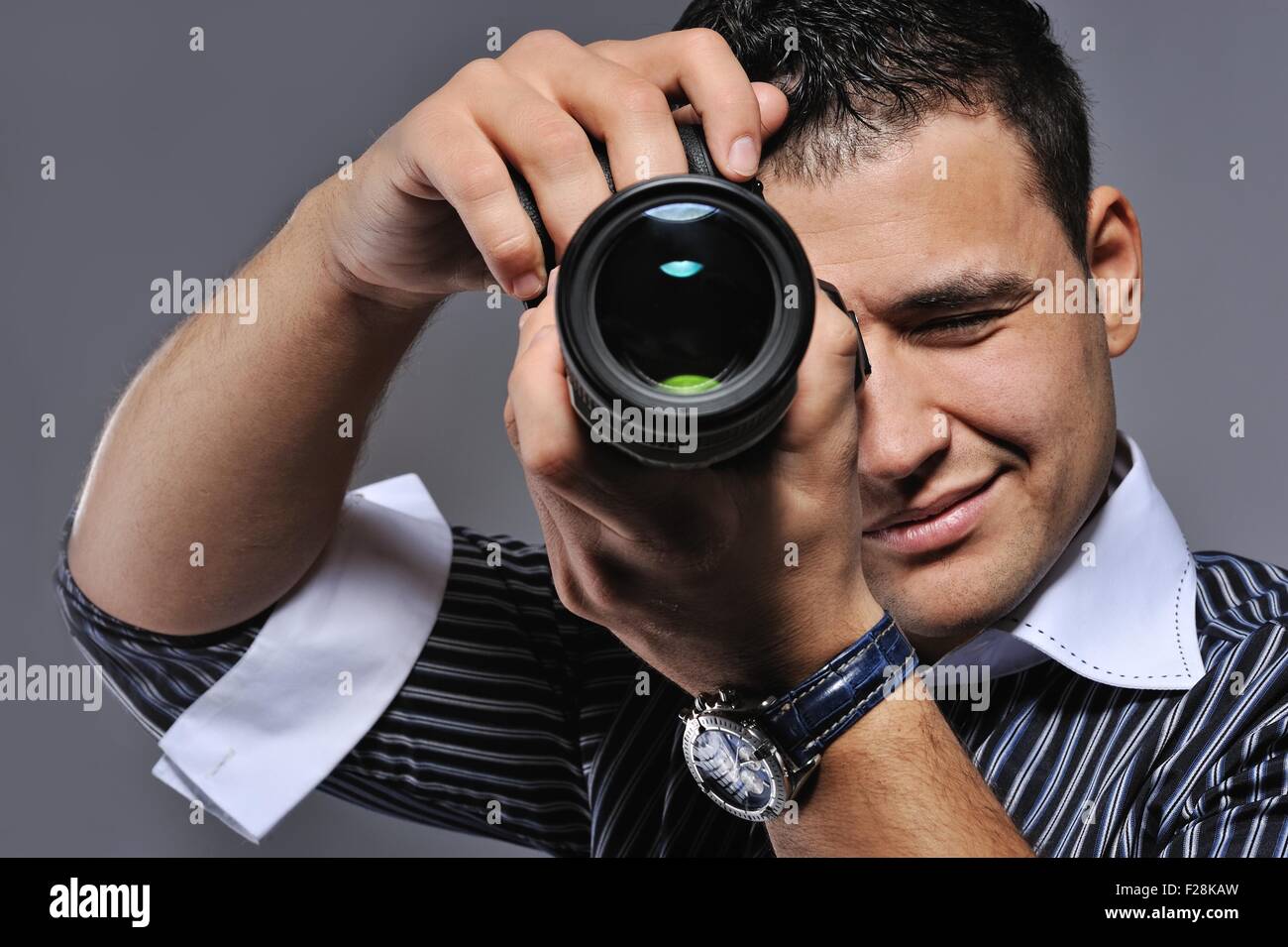 Photographer making a shot Stock Photo - Alamy