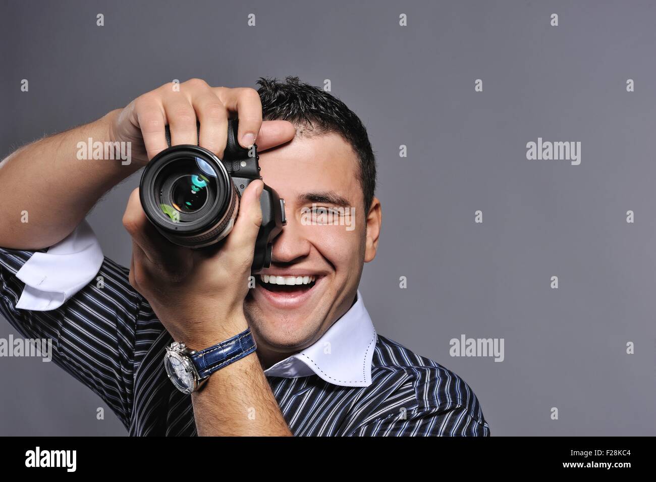 Photographer making a shot Stock Photo - Alamy