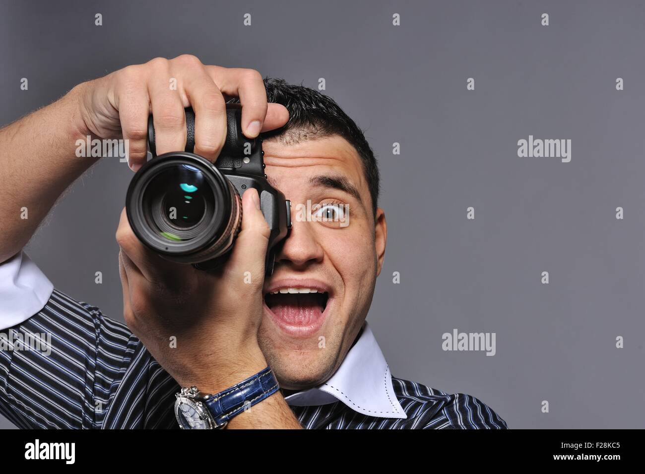 Photographer making a shot Stock Photo - Alamy