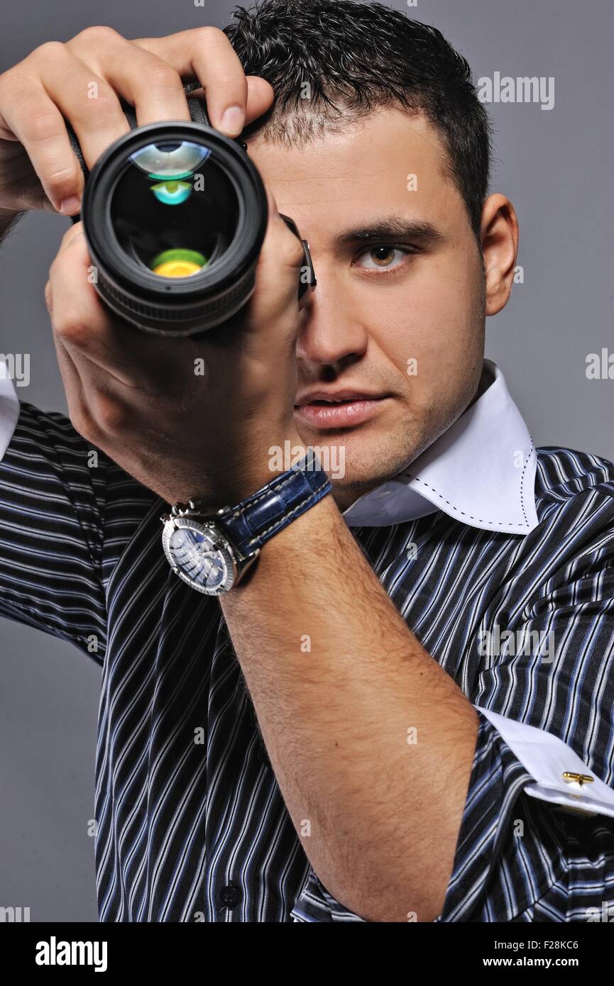 Photographer making a shot Stock Photo - Alamy