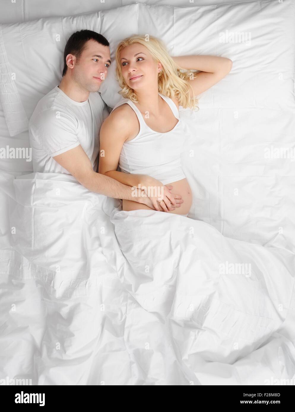 Adorable couple expecting a baby Stock Photo - Alamy