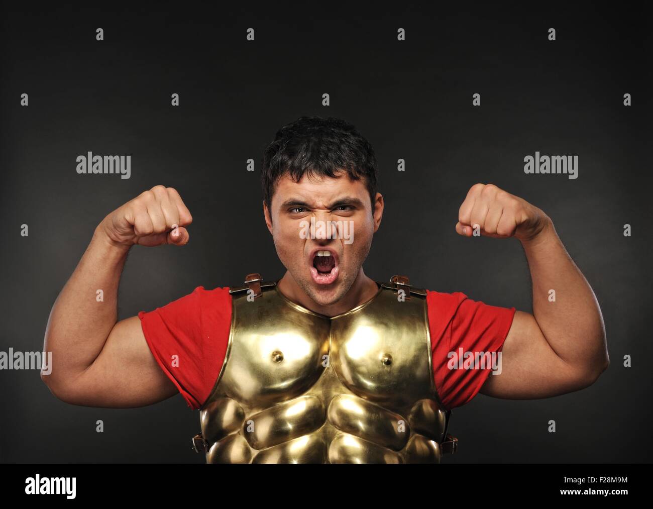 Legionary soldier showing his strength Stock Photo - Alamy
