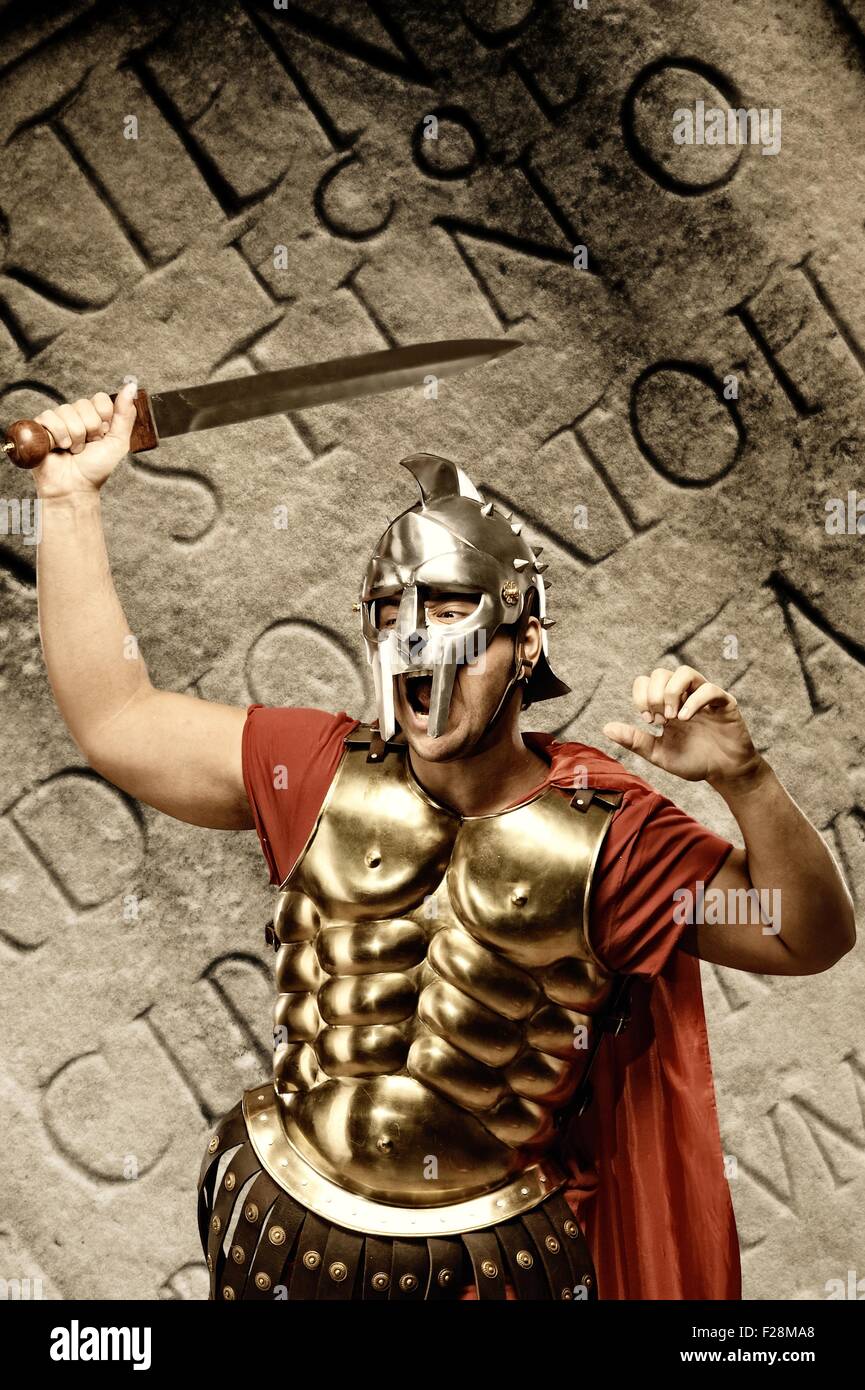 Roman legionary soldier in front of abstract wall Stock Photo - Alamy