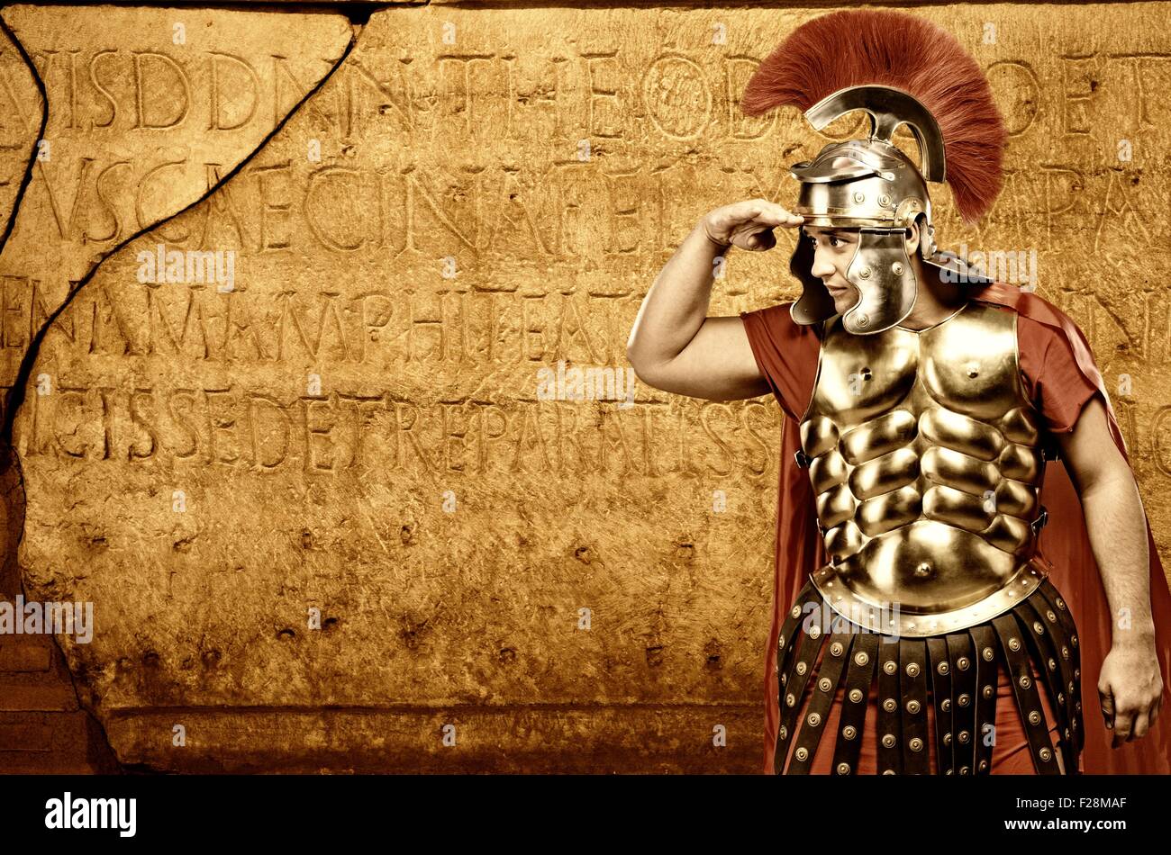 Roman legionary soldier in front of abstract wall Stock Photo - Alamy