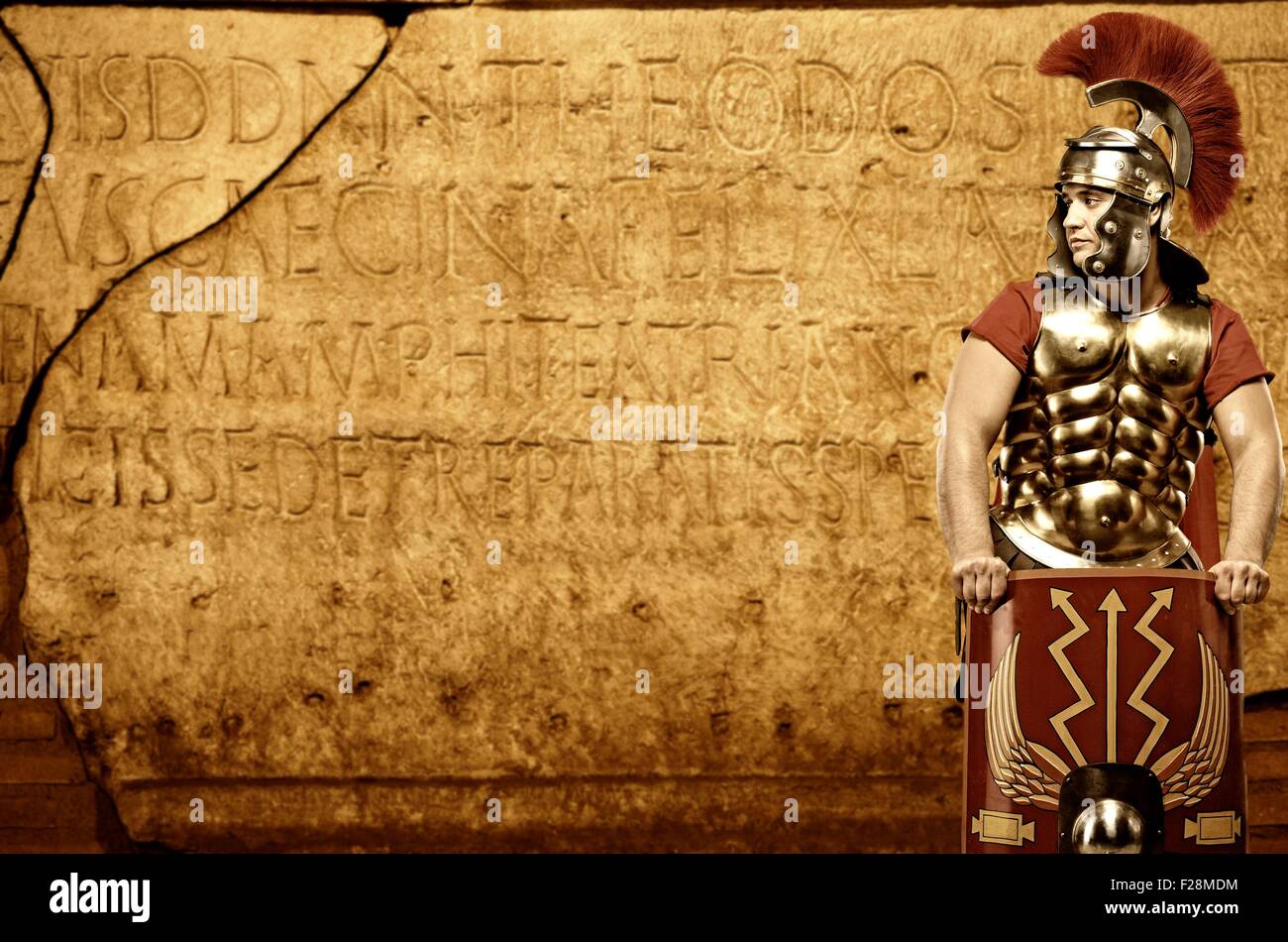 Roman legionary soldier in front of abstract wall Stock Photo - Alamy