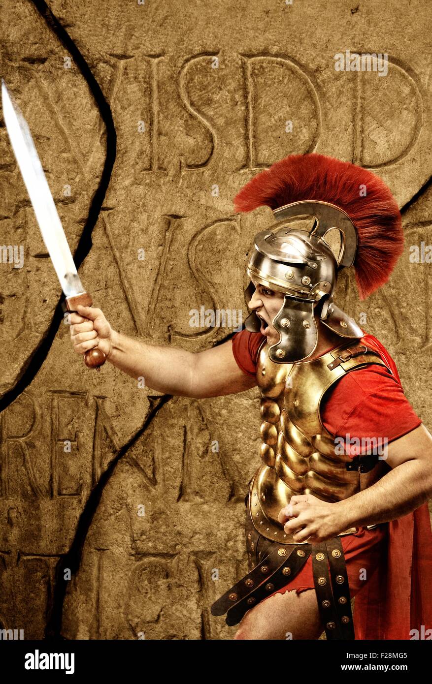 Roman legionary soldier in front of abstract wall Stock Photo - Alamy