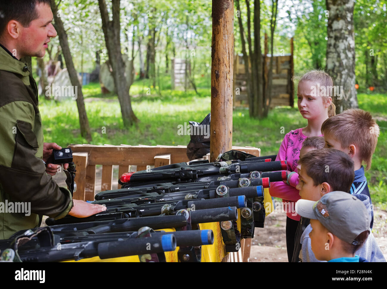 Play laser tag on a special testing ground in spring forest. Vitebsk ...