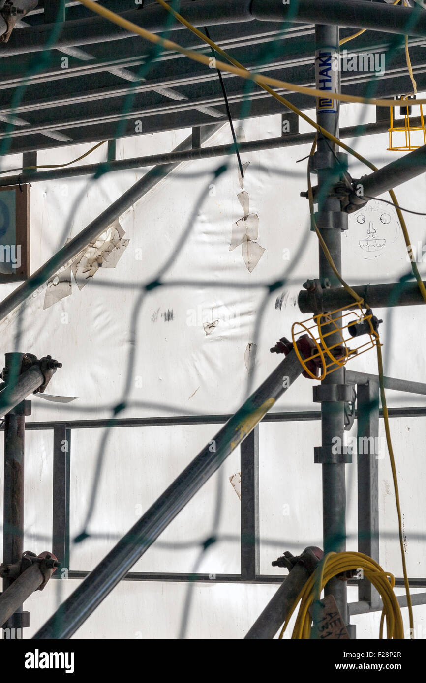 Scaffold and netting covering renovations of castle drogo hi-res stock ...