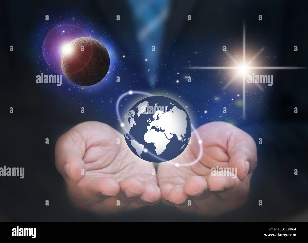 Hands and planets hi-res stock photography and images - Alamy