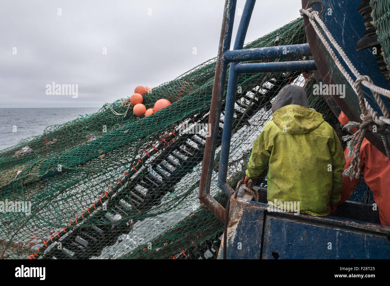 Fishermen hauling in boat on hi-res stock photography and images - Alamy