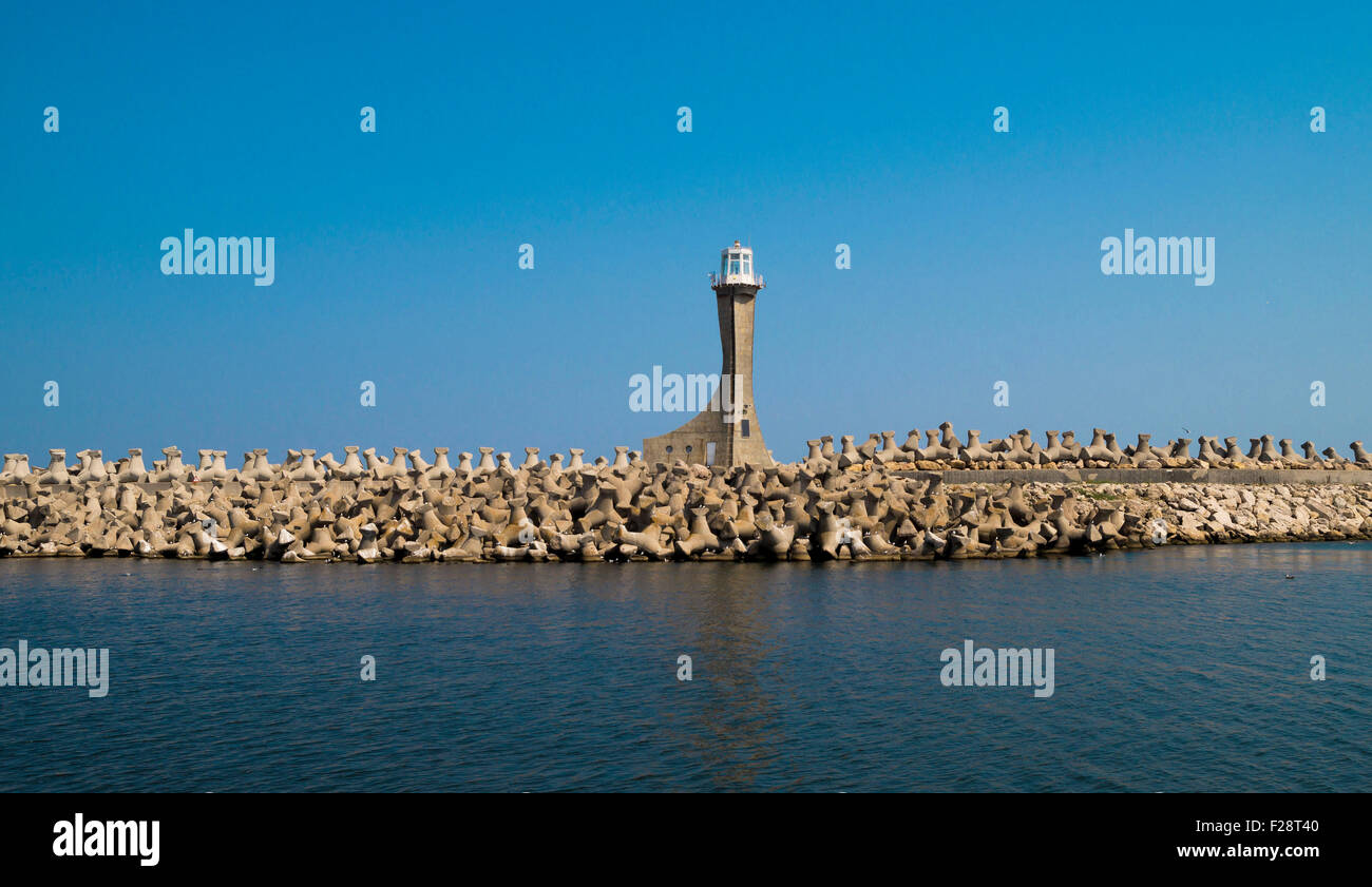 Lighthouse and breakwaters in Port Constanta, Romania Stock Photo - Alamy