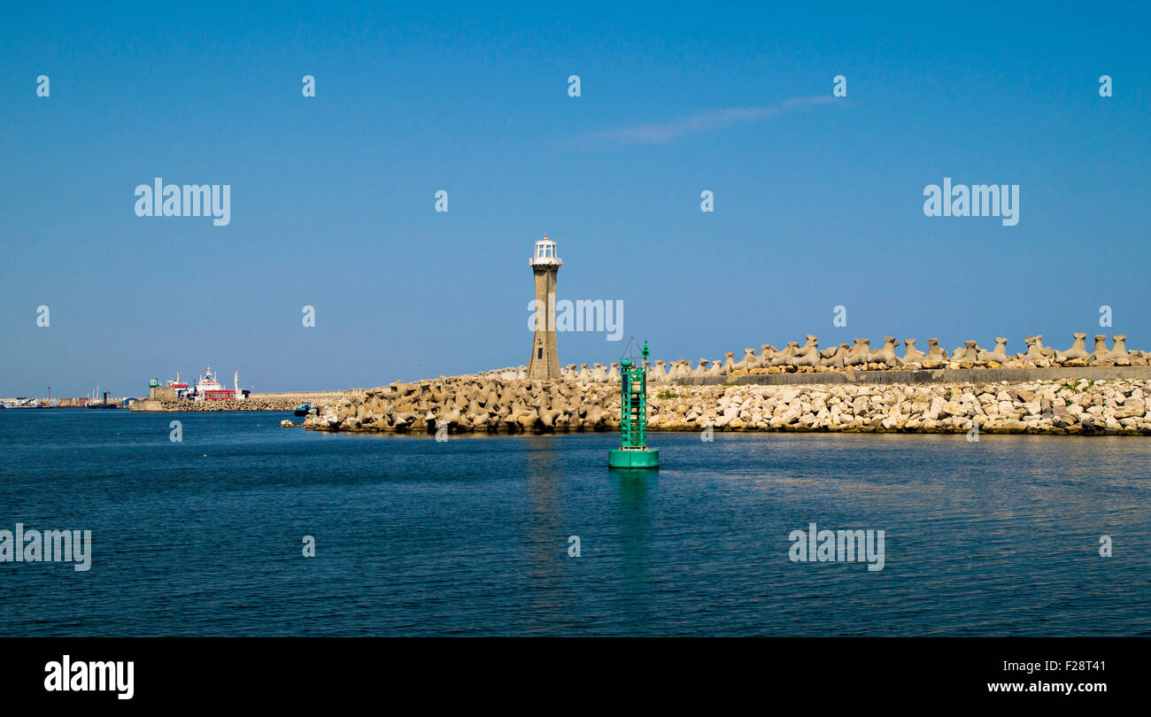 Lighthouse and breakwaters in Port Constanta, Romania Stock Photo - Alamy