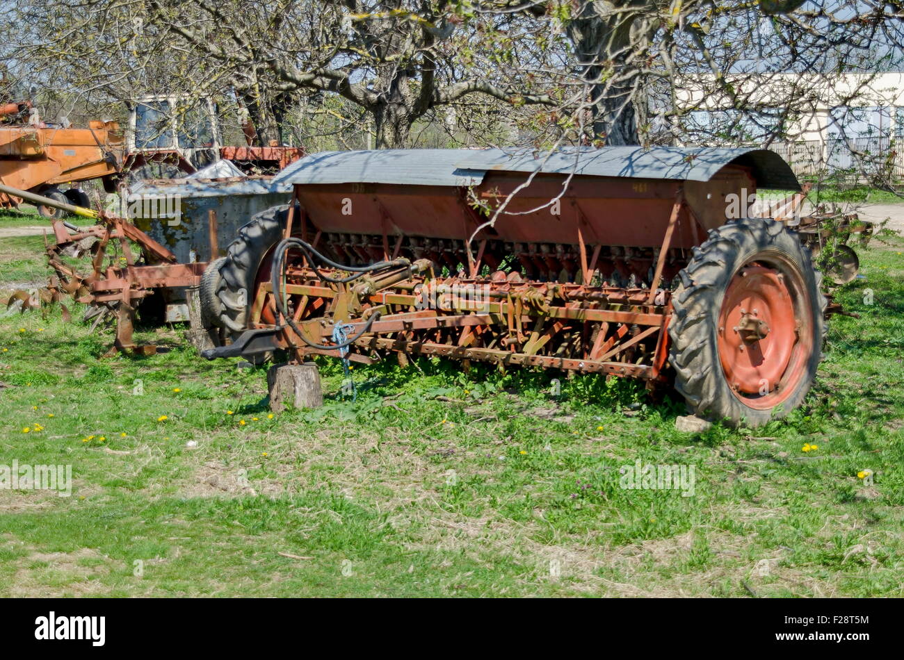 Old abandoned farm machinery, drill, plough, Bulgaria Stock Photo - Alamy