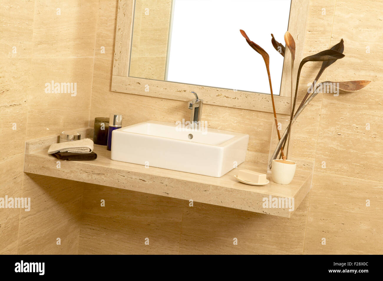 Basin with soap and towels in a bathroom Stock Photo - Alamy