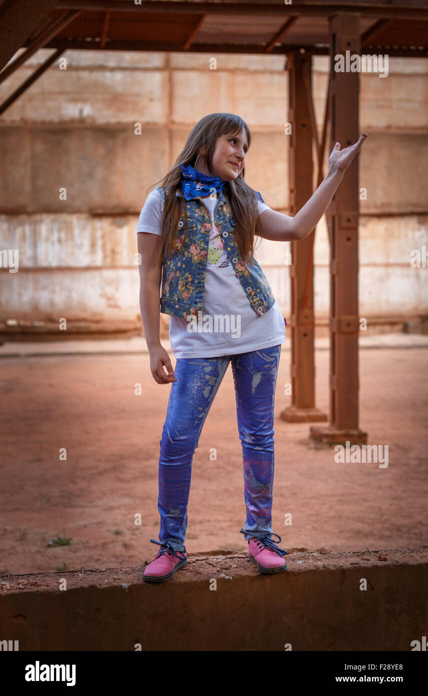 Portrait of the girl on a stone background Stock Photo - Alamy