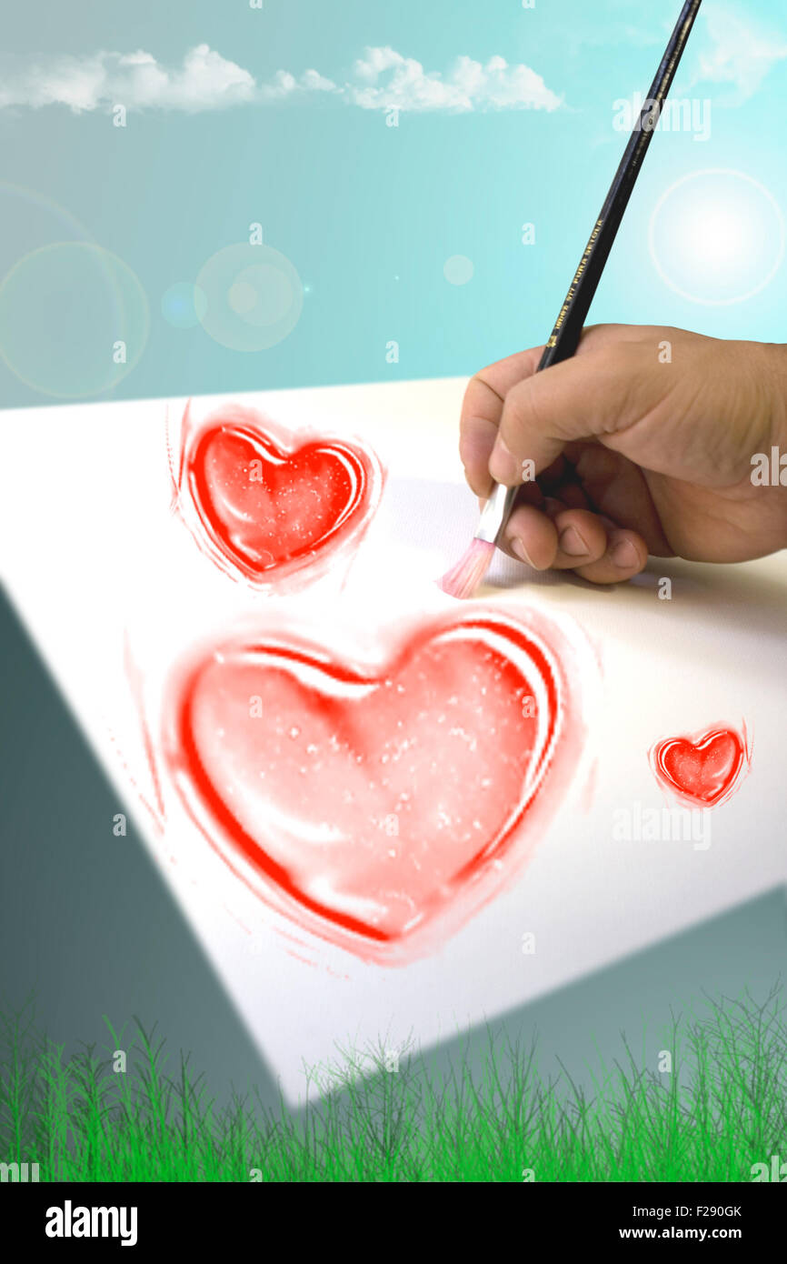 Hand painting red hearts with a paintbrush Stock Photo - Alamy