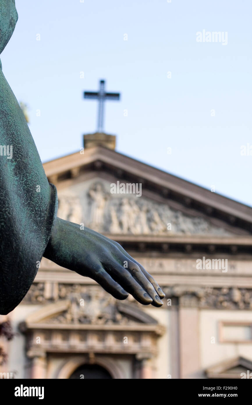 Hand of a bronze statue, Milan Stock Photo - Alamy