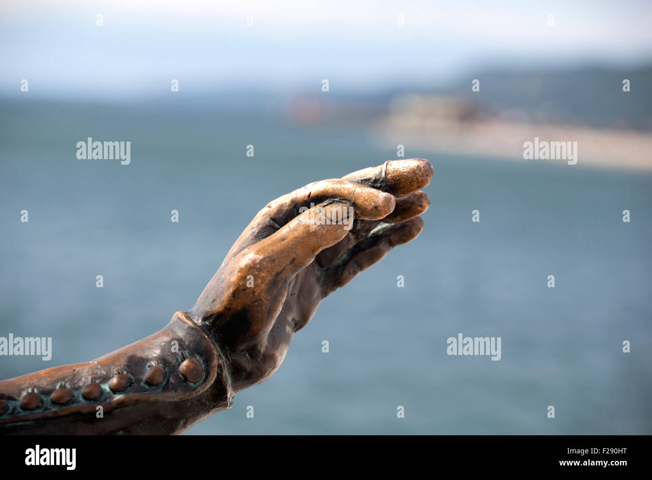 Hand of a bronze statue, Trieste Stock Photo - Alamy