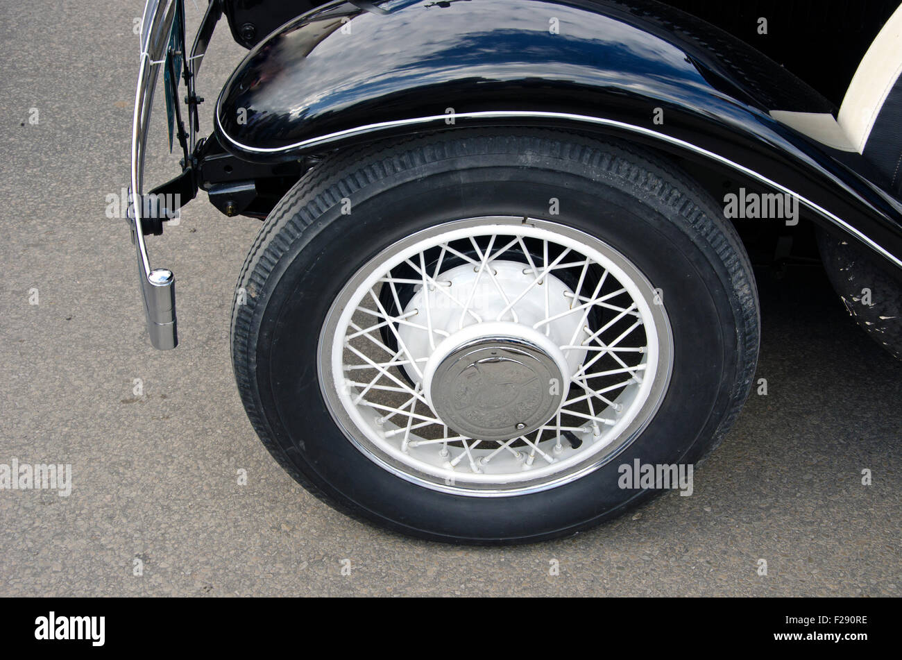 beautiful wheel of black antique car Stock Photo - Alamy