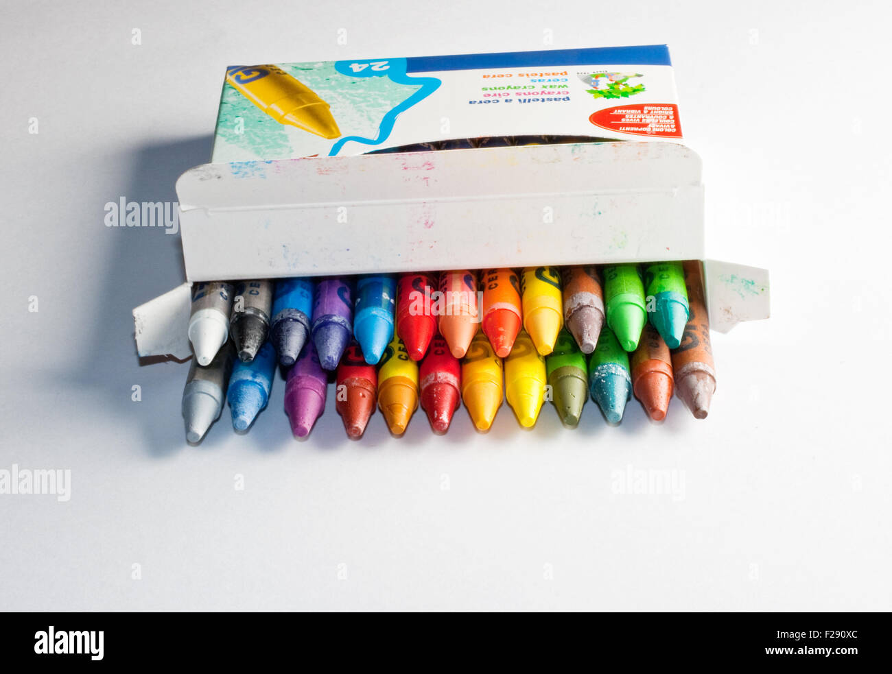 Close up of crayons inside a box, isolated on white background Stock ...