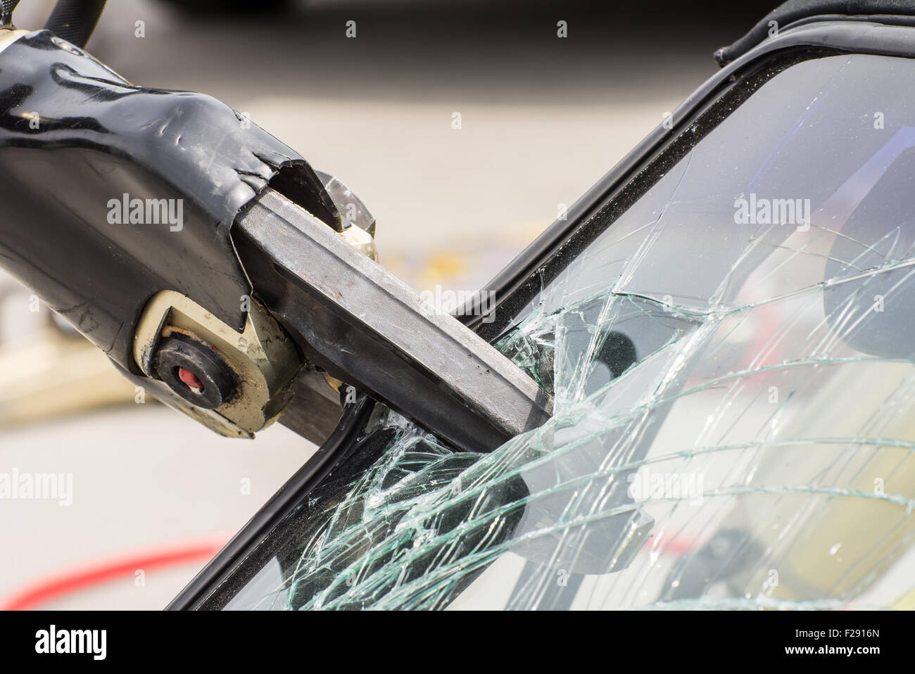 Rescue with a hydraulic cutter after a car accident Stock Photo - Alamy