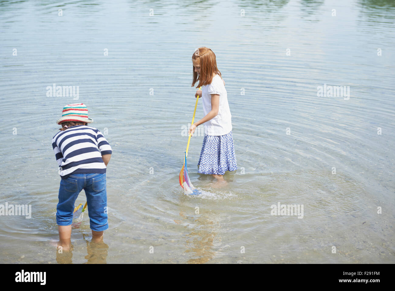 Two friends fishing in a lake, Bavaria, Germany Stock Photo - Alamy