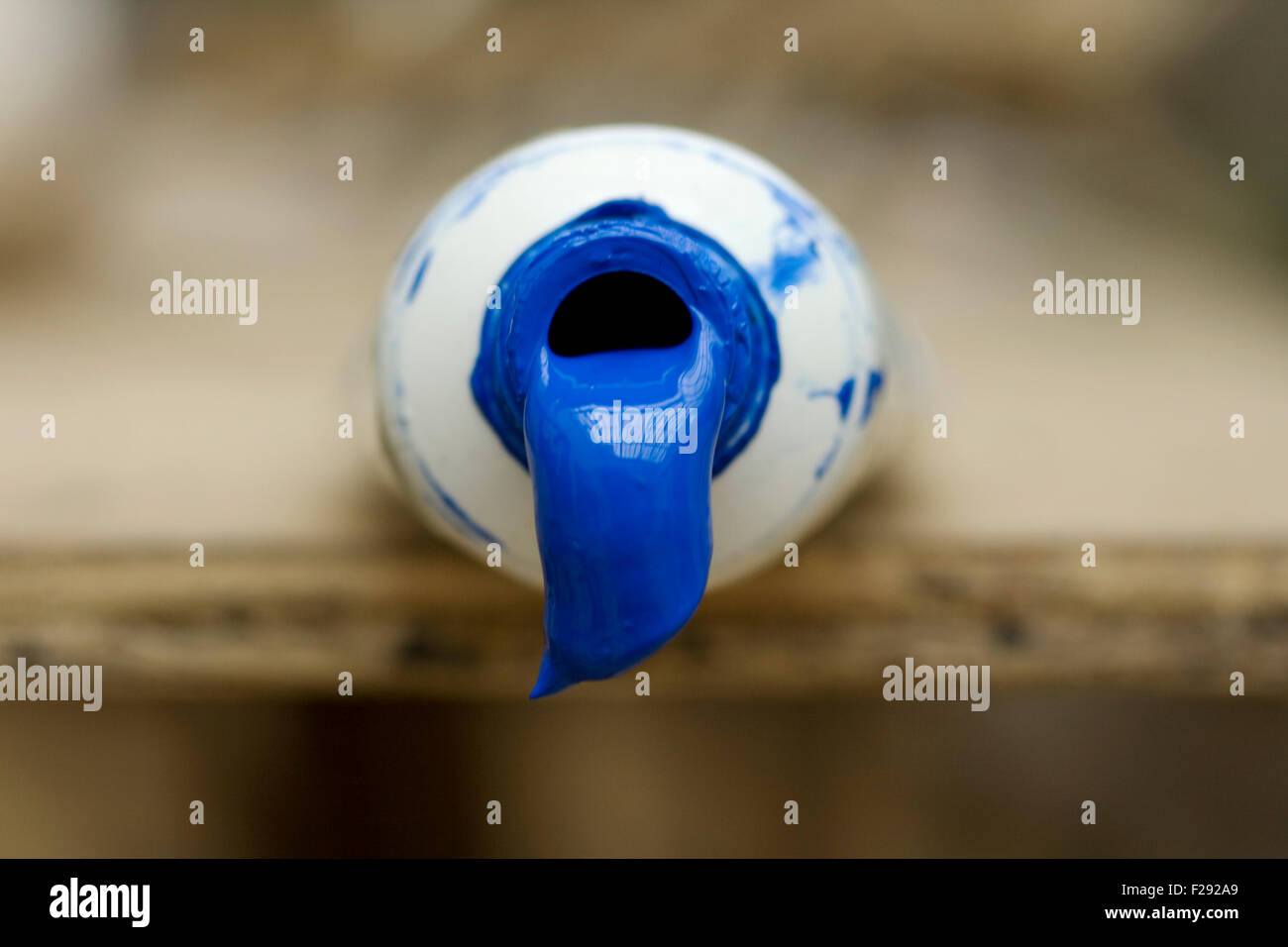 Drop of blue color inside a tube Stock Photo - Alamy