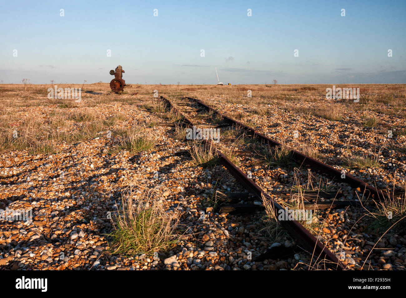 Abandoned old rail track and winch on the shingle beach of Dungeness ...