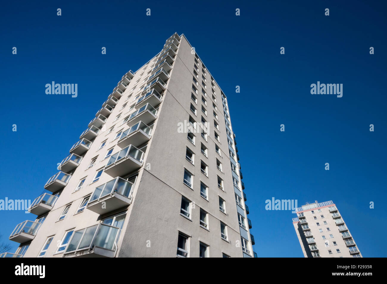 Looking up at two high rise blocks of flats at Hollington, St Leonards ...