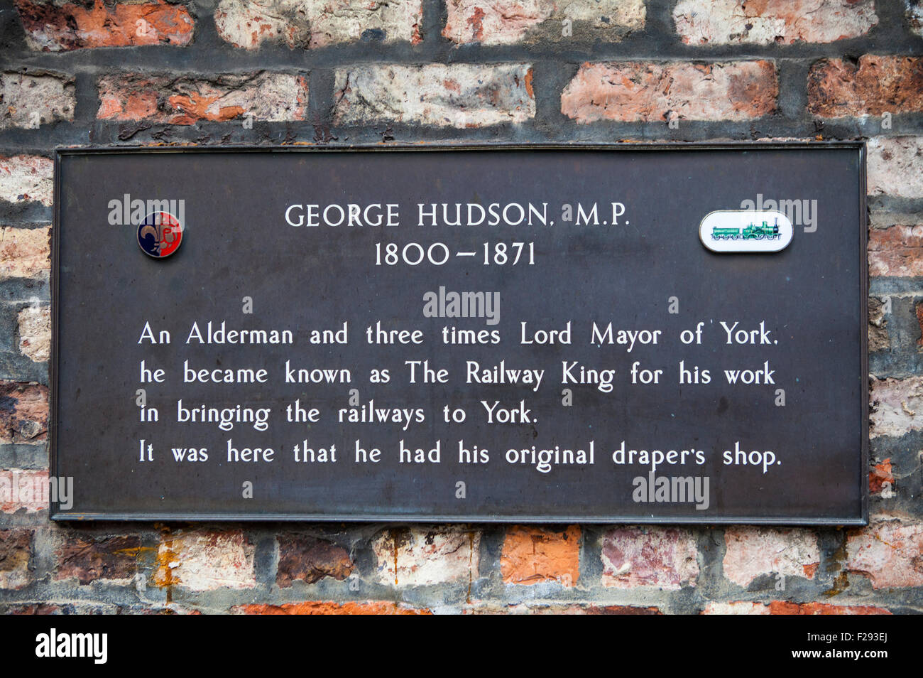 A plaque remembering the work of George Hudson M.P. in York, England ...