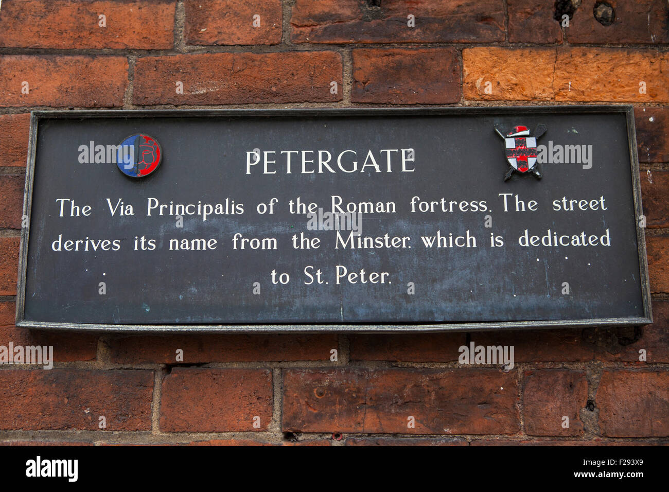 A plaque detailing the history of Petergate in York, England Stock ...