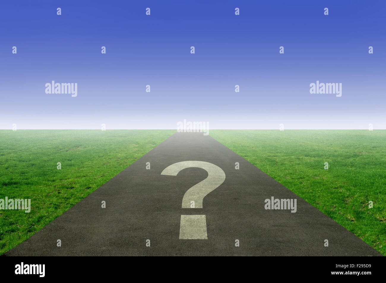 Question mark printed on an open road leading out to the horizon Stock ...